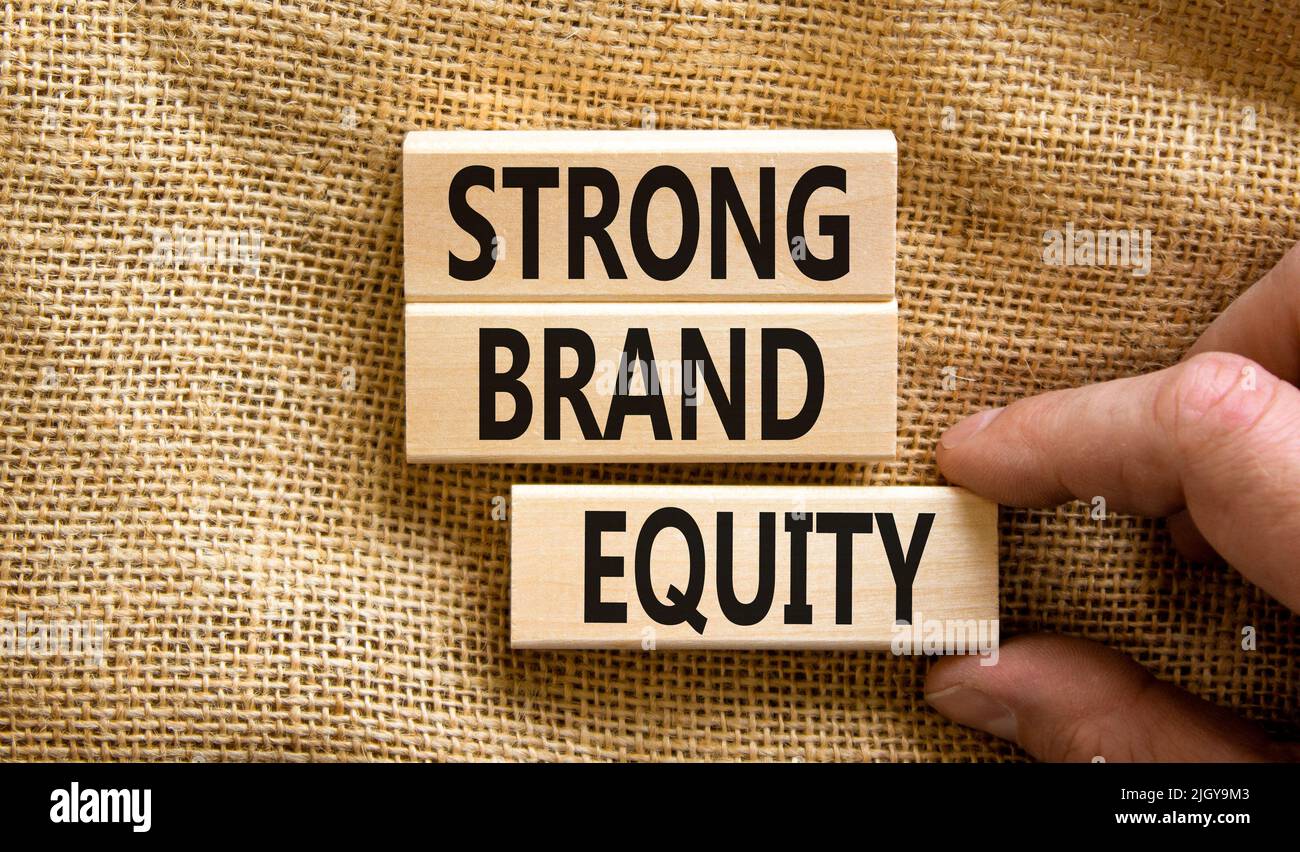 Strong brand equity symbol. Concept words Strong brand equity on wooden ...