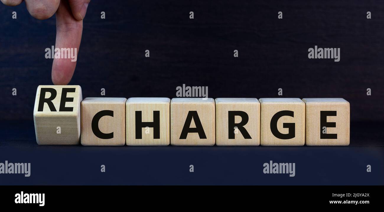 Charge or recharge symbol. Turned wooden cubes and changed the word ...