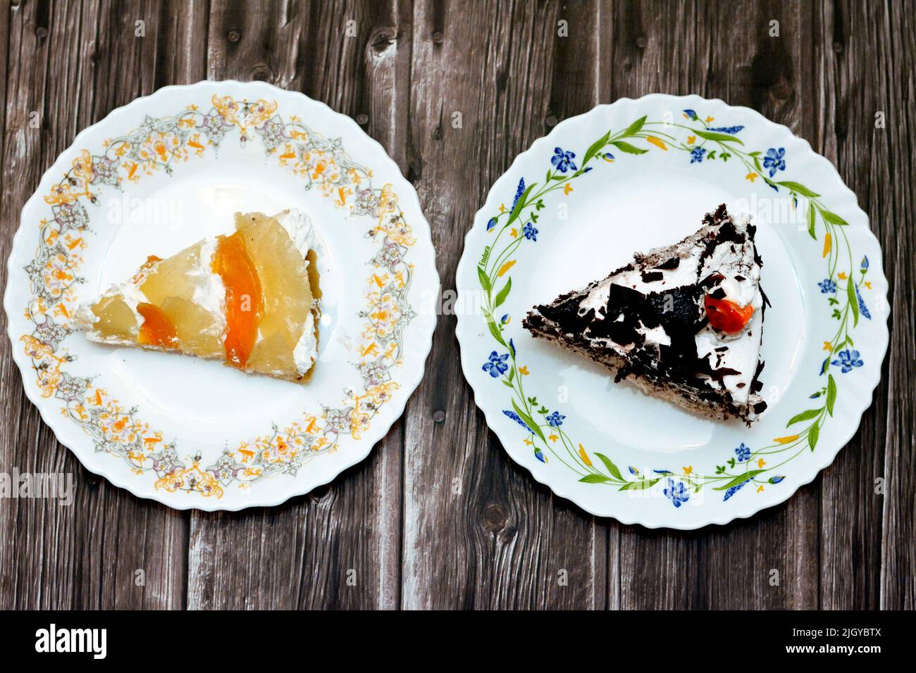 A sliced piece of black forest cake, a chocolate sponge cake layered ...