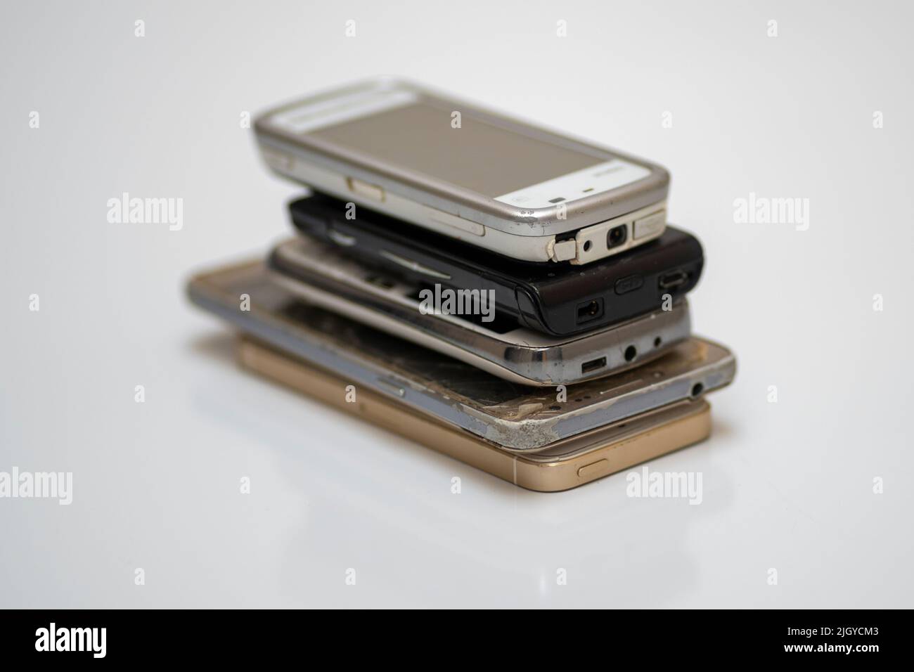 A close-up shot of disposed damaged smartphones Stock Photo - Alamy