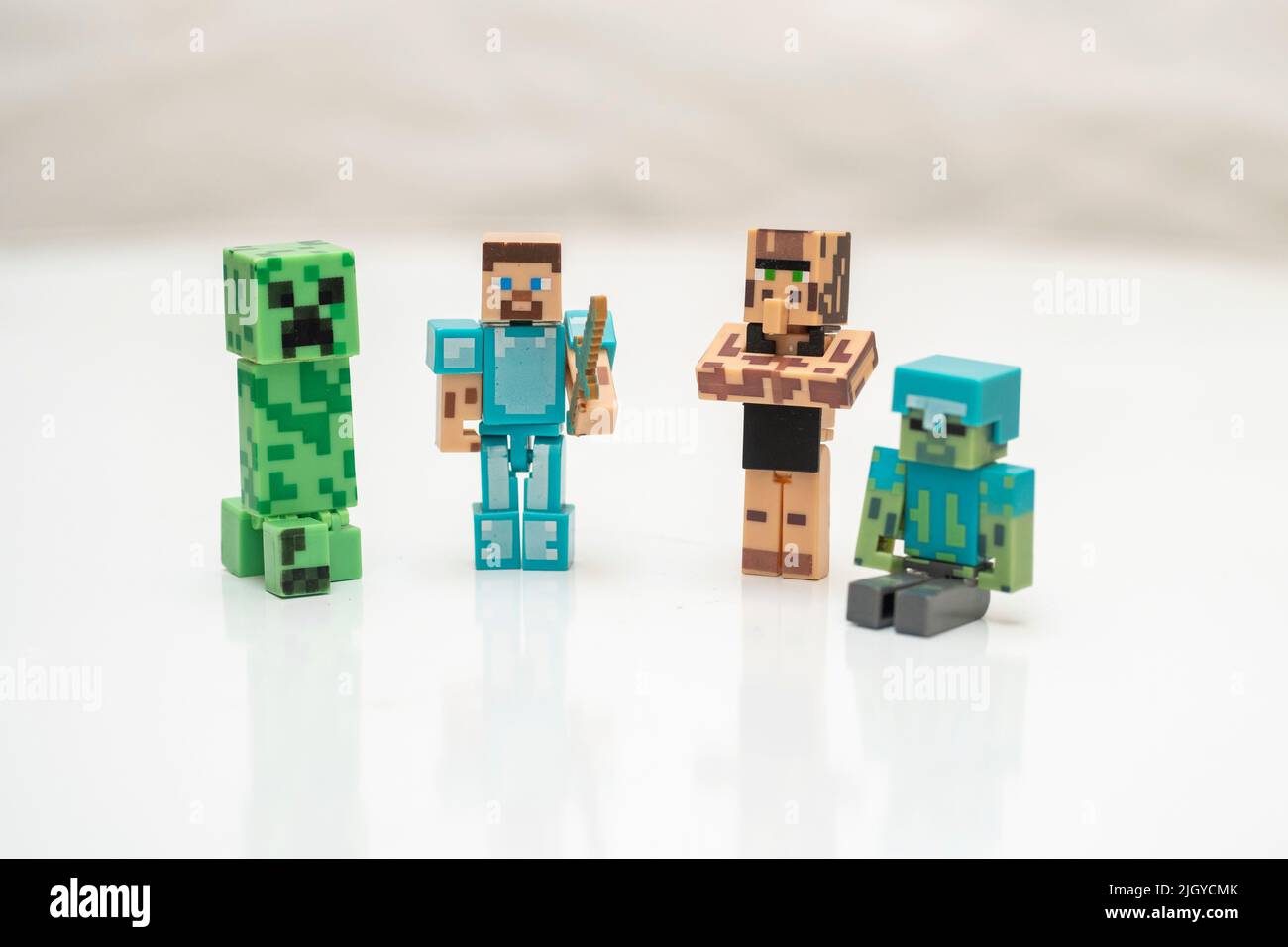 A close-up shot of Minecraft action figures on a white background Stock ...
