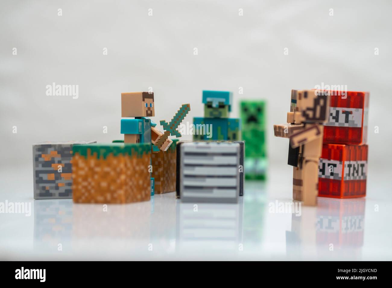 A close-up shot of Minecraft action figures on a white background Stock ...