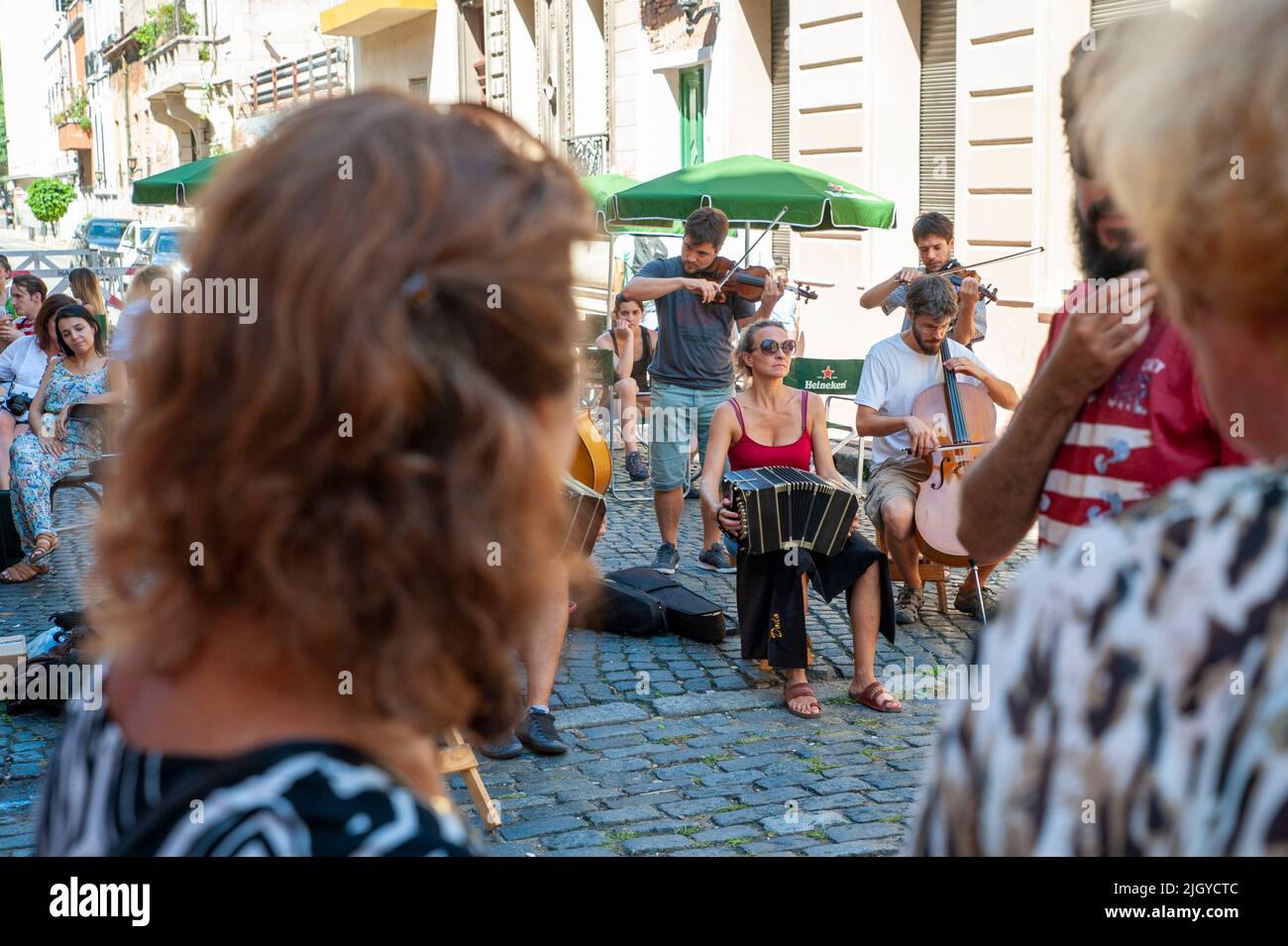 The street musicians having a concert for tourists Stock Photo - Alamy