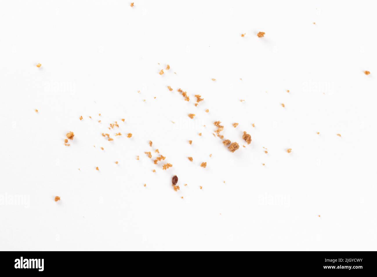 Scattered crumbs isolated on white background Stock Photo - Alamy