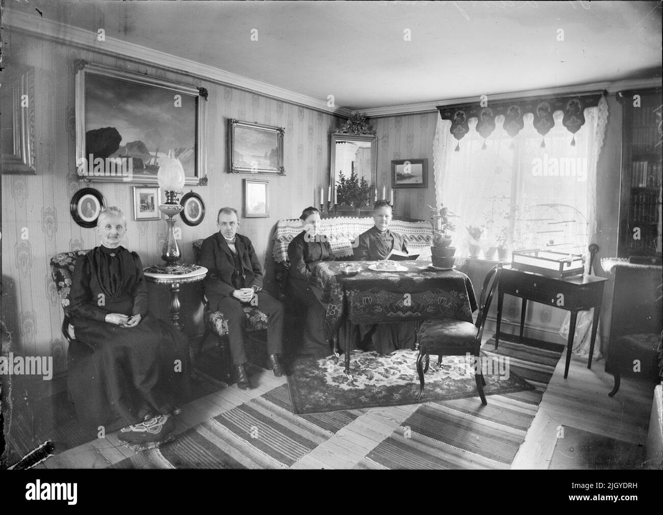 Three older women and one man in the home, Uppsala in 1909. Historical ...