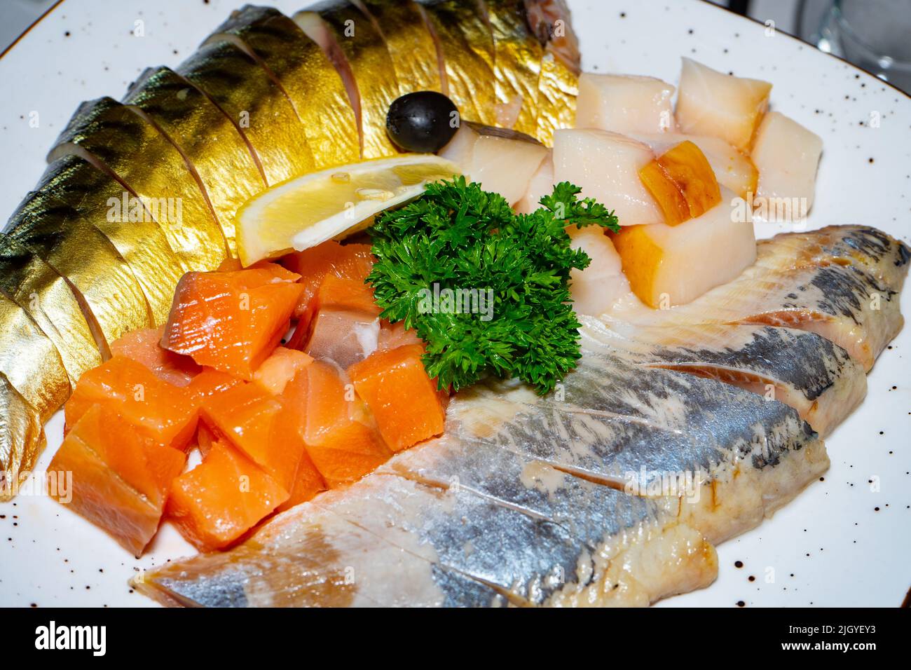 A snack of several types of fish is ready to eat Stock Photo - Alamy