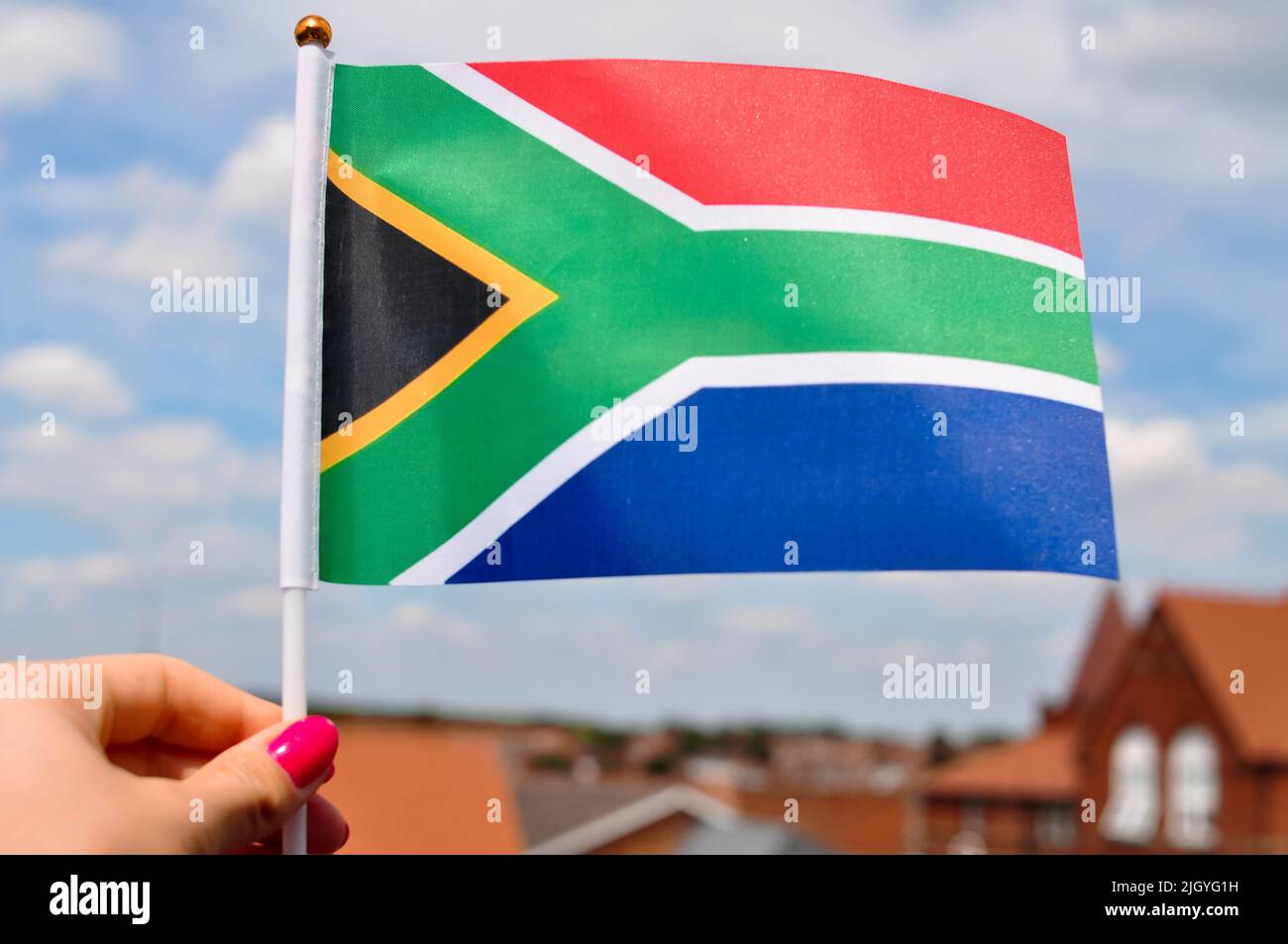 close up of national flag of south africa,red green and blue colors ...