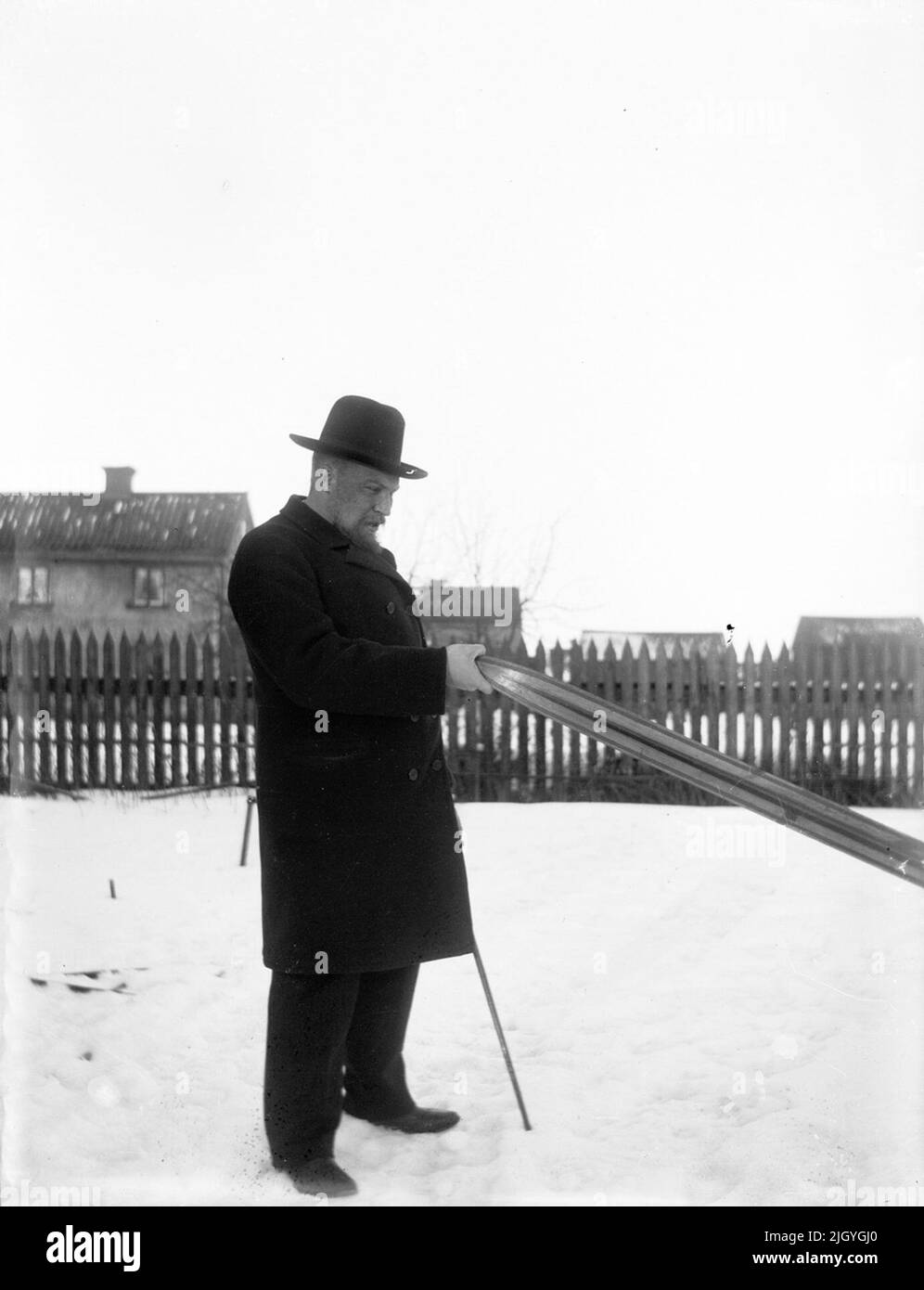 Male with ski, neighborhood Edda, Svartbäcksgatan, Uppsala. Male With ...