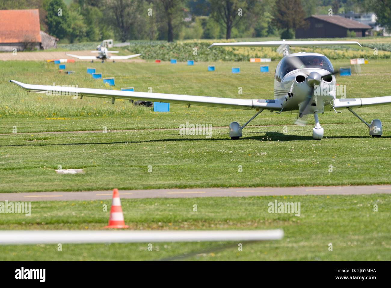 Lommis, Switzerland, May 11, 2022 Diamond DA40D propeller plane is ...