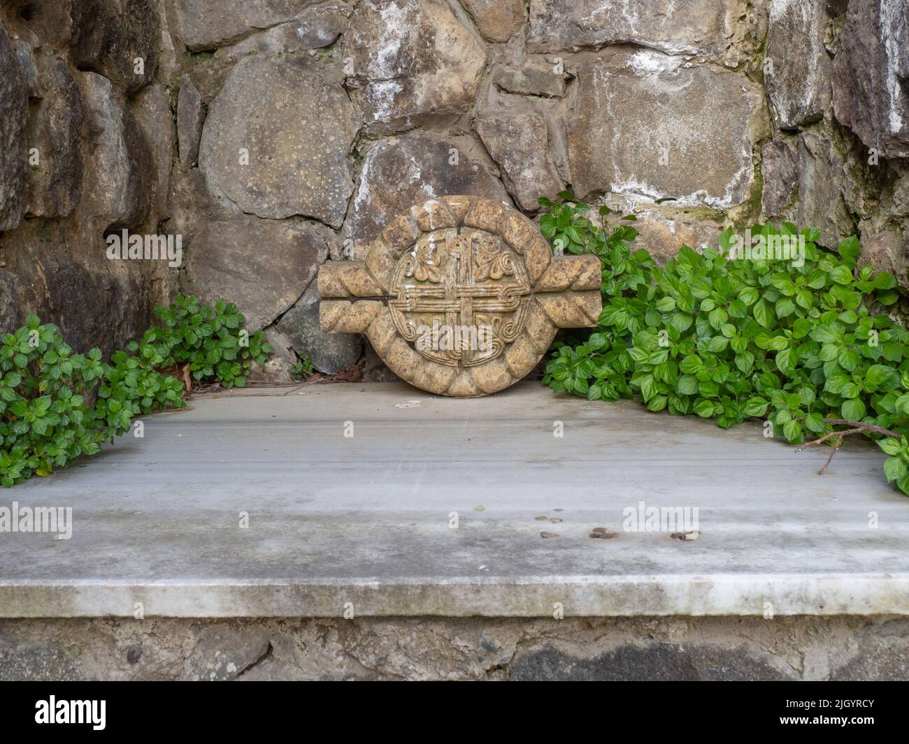 Ancient parts of the temple. Restoration work. Artifact. Part of an ...