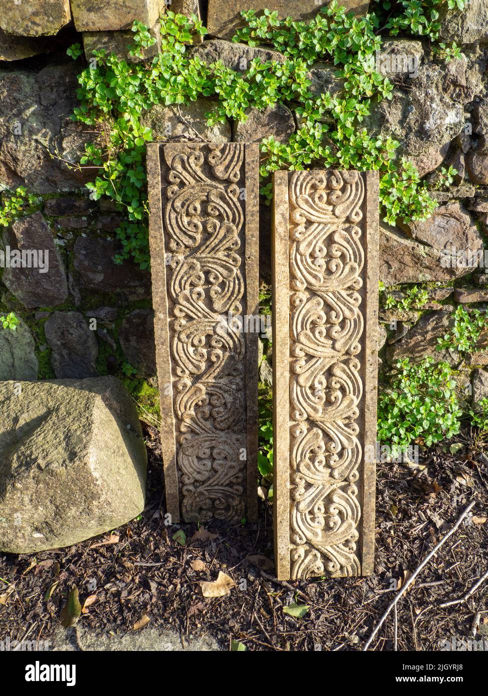 Ancient slabs from the temple. Restoration work. Part of an ancient ...