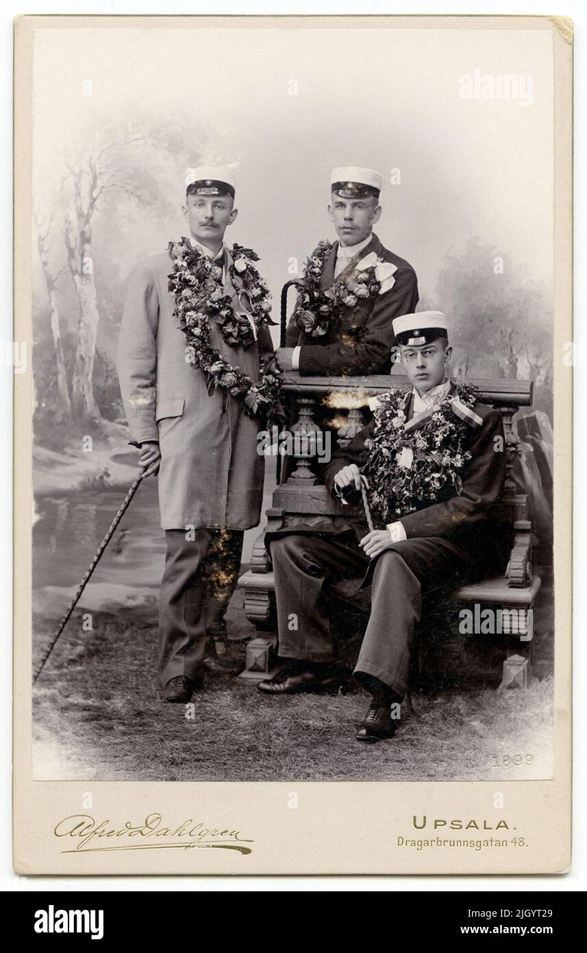 Ateljé portrait - three men dressed in student caps, with cane and ...