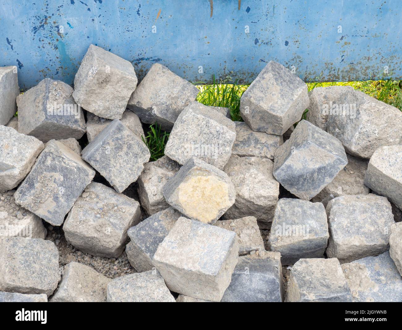 Cobblestone hill. Broken pavement stones. Building supplies. abandoned ...