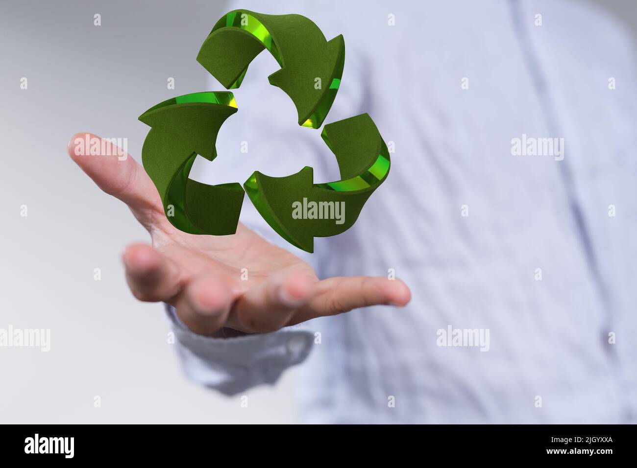A person presenting a virtual projection of recycling concept Stock ...