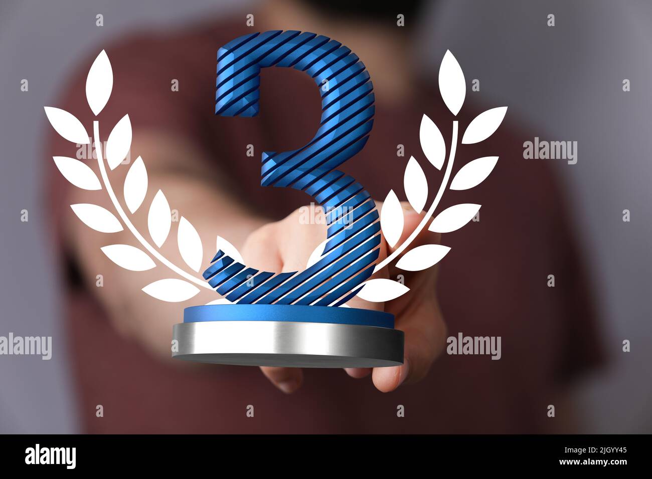 A person presenting a virtual projection of a third place award Stock ...