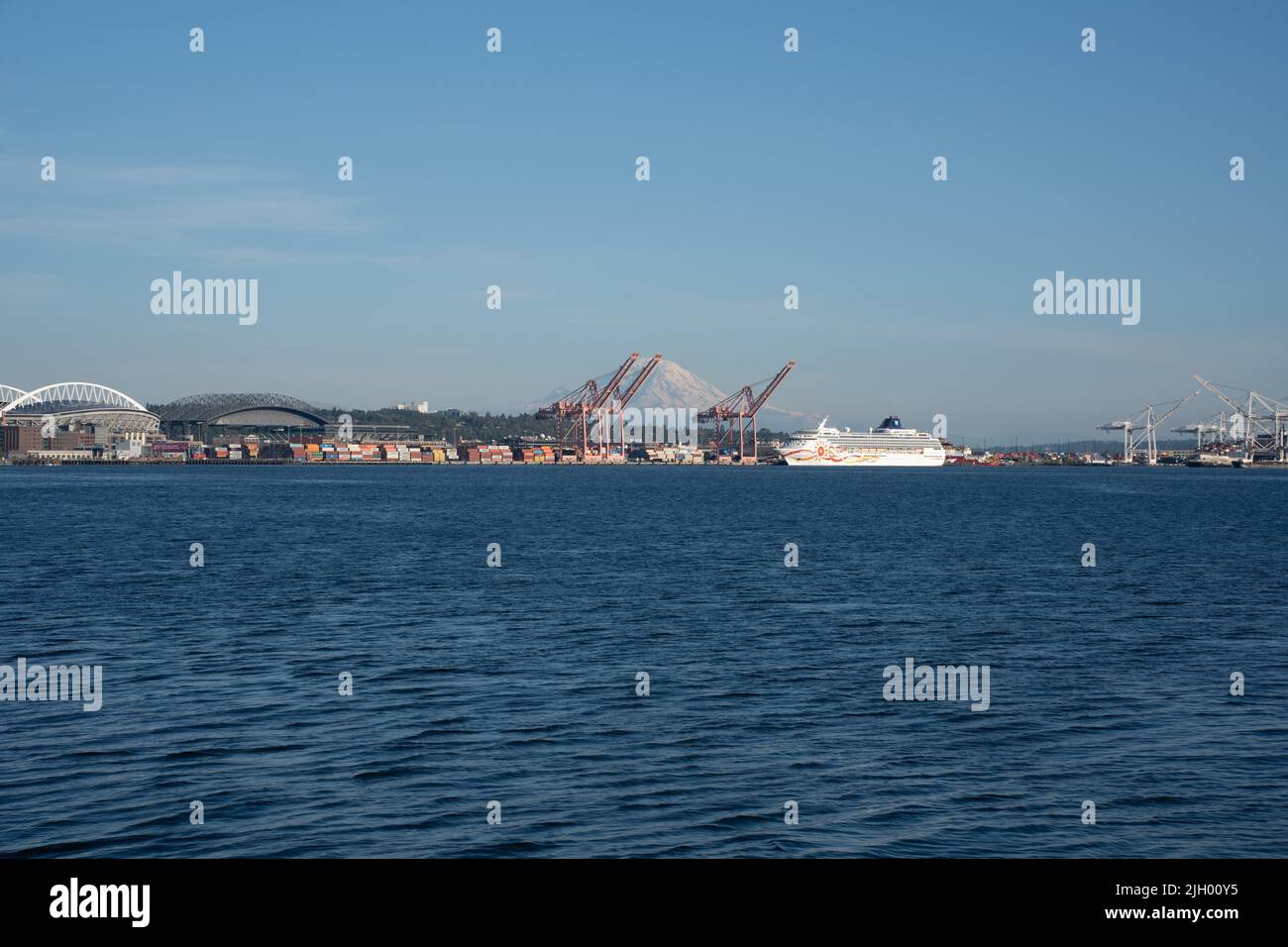 A huge cruise ship sailing in front of the harbor of Belltown, Seattle ...