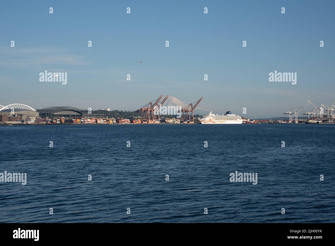 A cruise ship sailing in front of the harbor of Belltown, Seattle ...