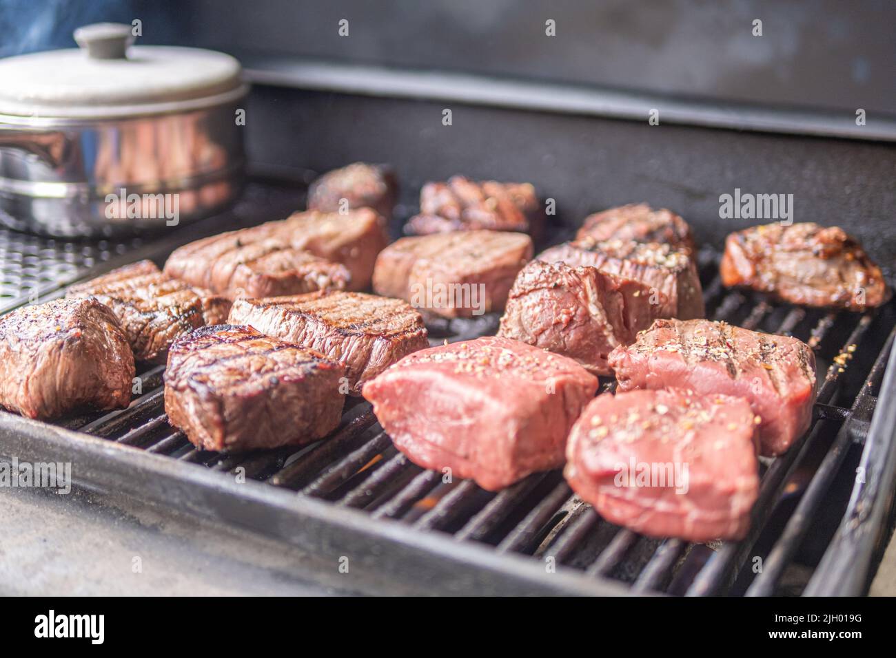 Organic Beef Stakes grilled for a party Stock Photo - Alamy