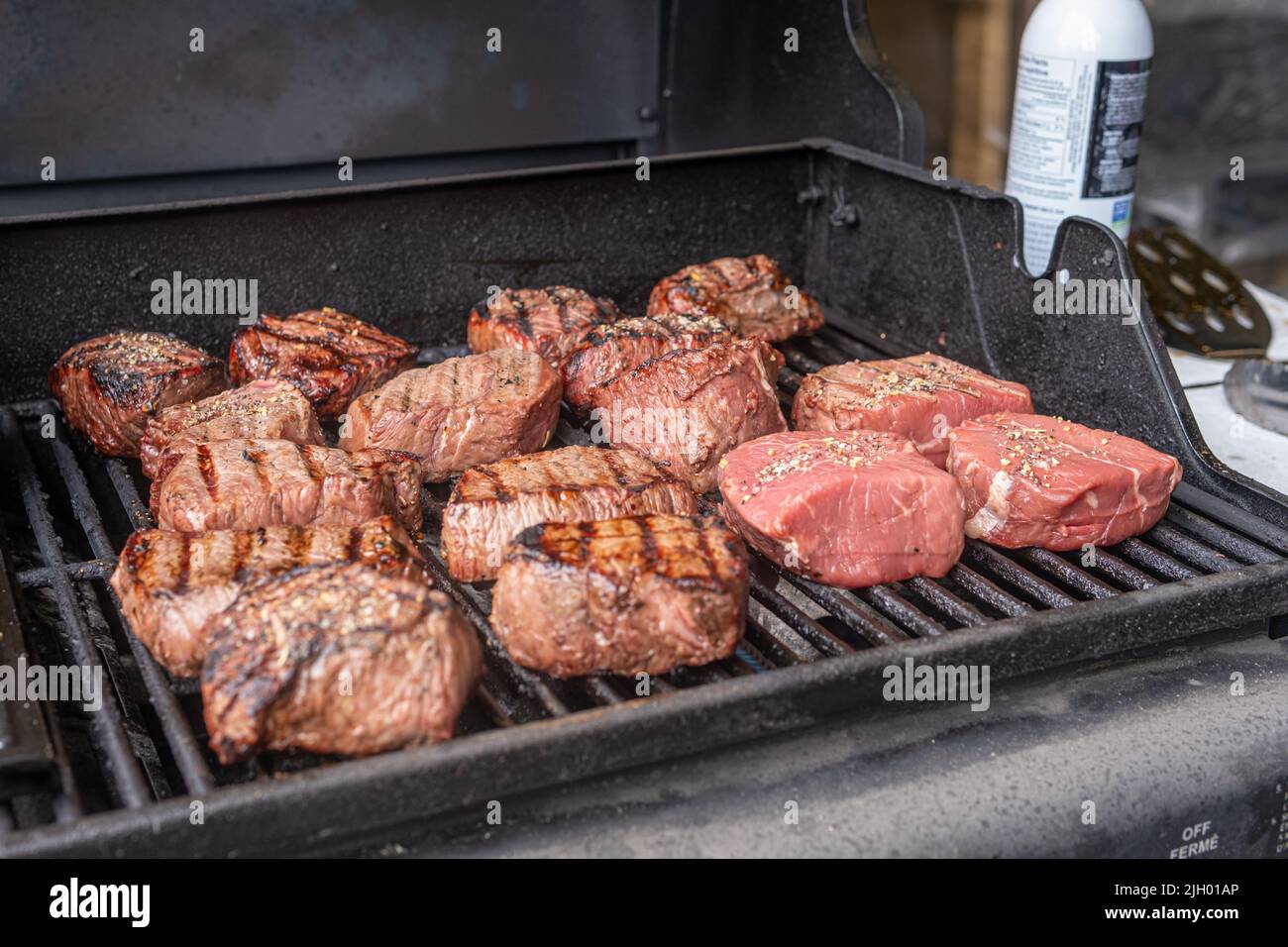 Organic Beef Stakes grilled for a party Stock Photo - Alamy