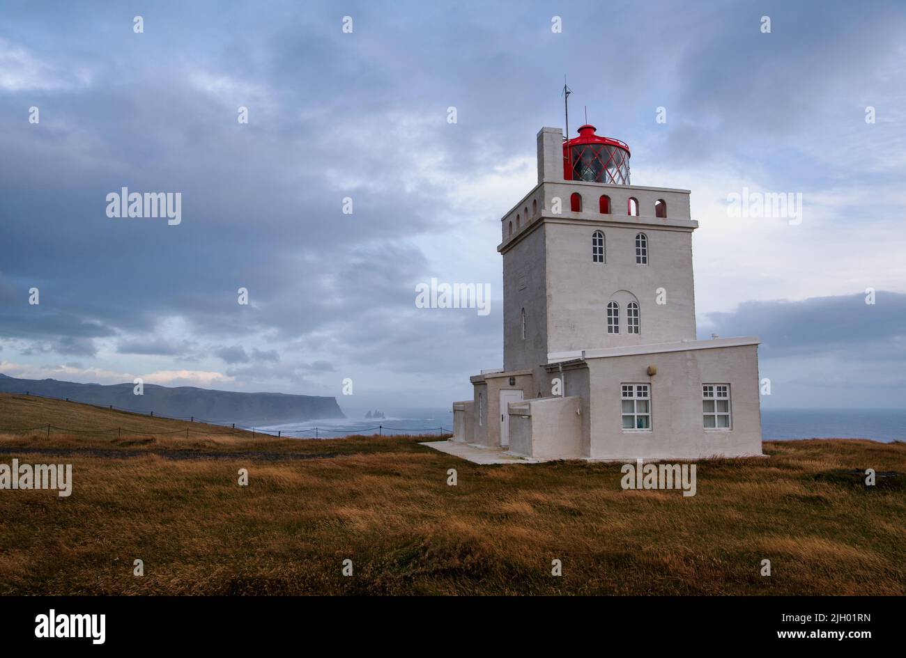 Dyrhólaey is a 120m high promontory and its name means “the door hole ...
