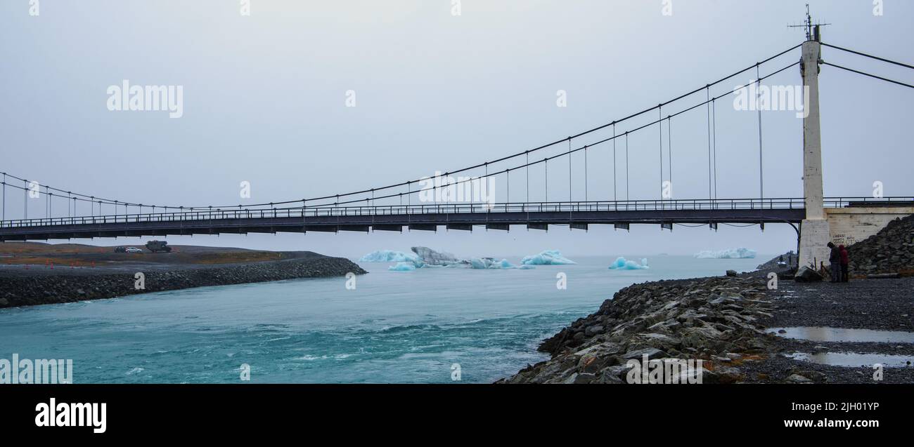 Small icebergs floating out of the Jökulsárlón glacial lagoon and will ...