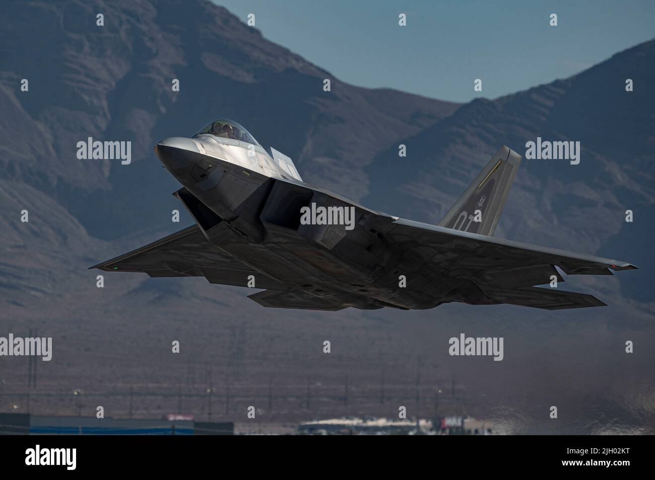 An F-22 Raptor assigned to the 433rd Weapons Squadron takes off from ...