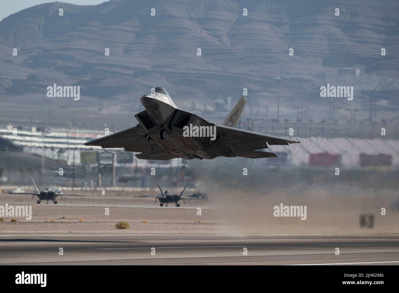 An F-22 Raptor assigned to the 433rd Weapons Squadron takes off from ...