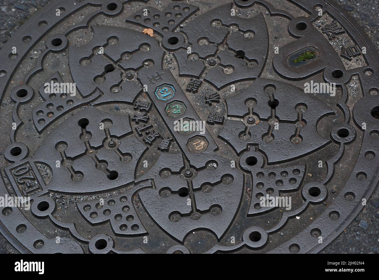 Artistic Manhole Cover in Tokyo, Japan Stock Photo - Alamy