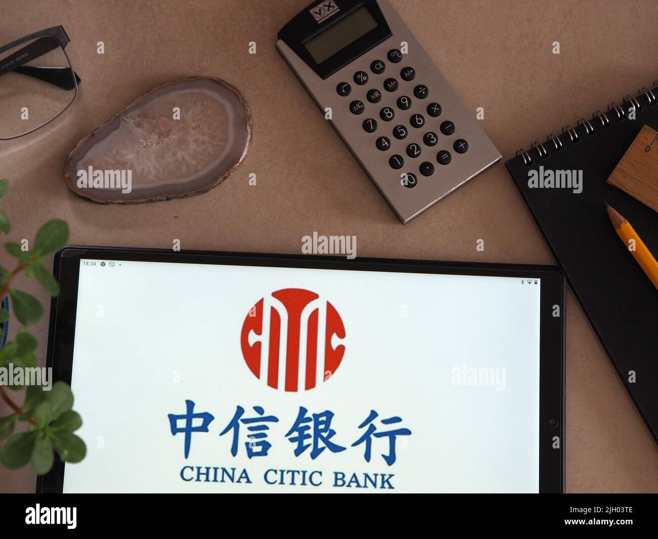 In this photo illustration a China CITIC Bank logo seen displayed on a ...