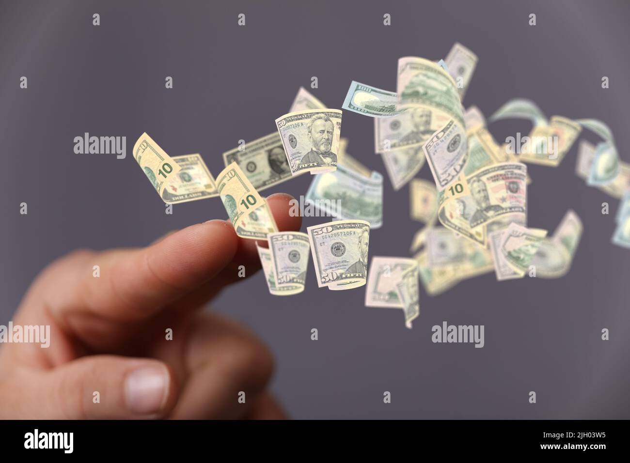 A money rain of dollar banknotes Stock Photo - Alamy