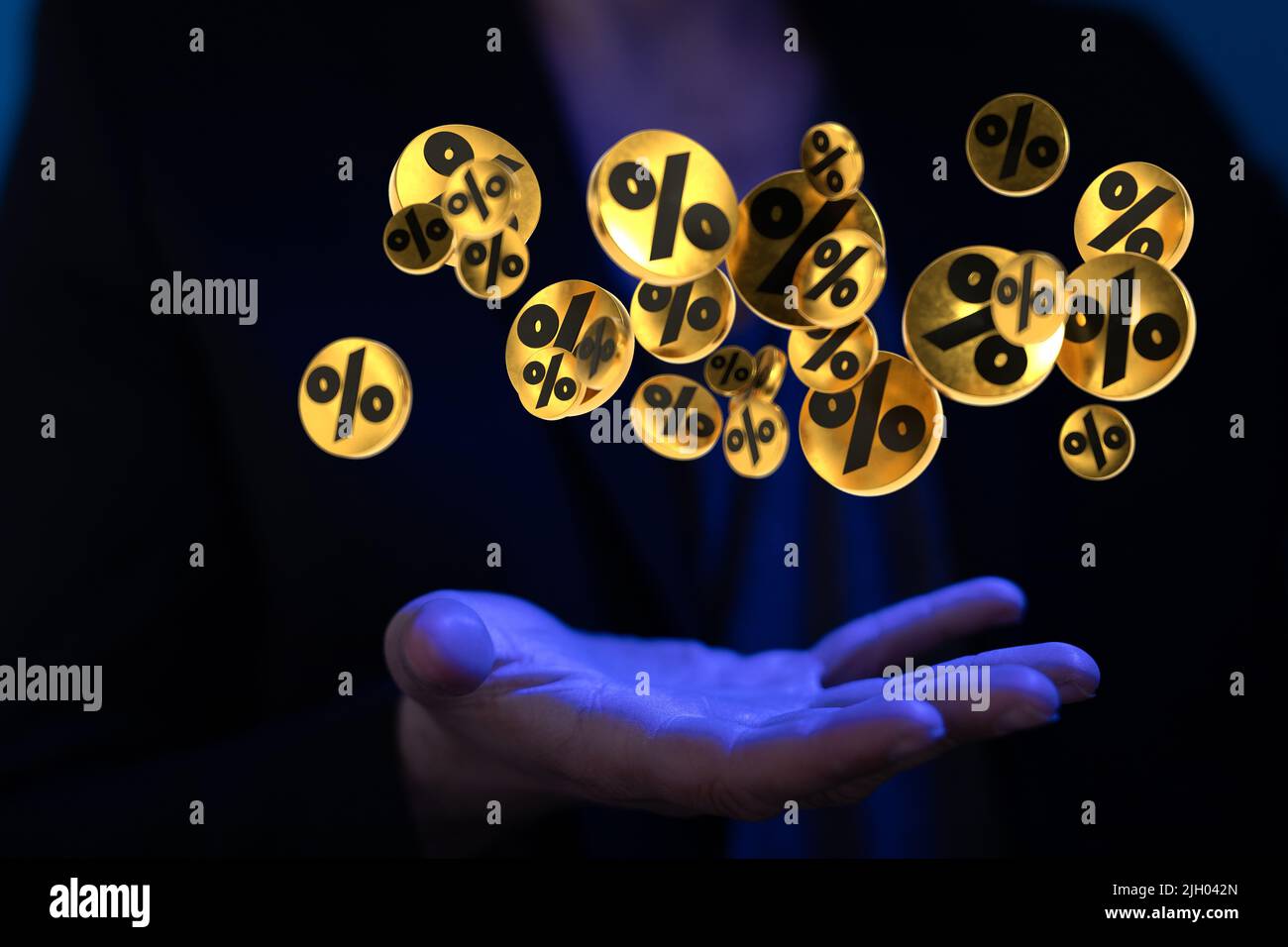 A person presenting a virtual projection of sale symbols Stock Photo ...