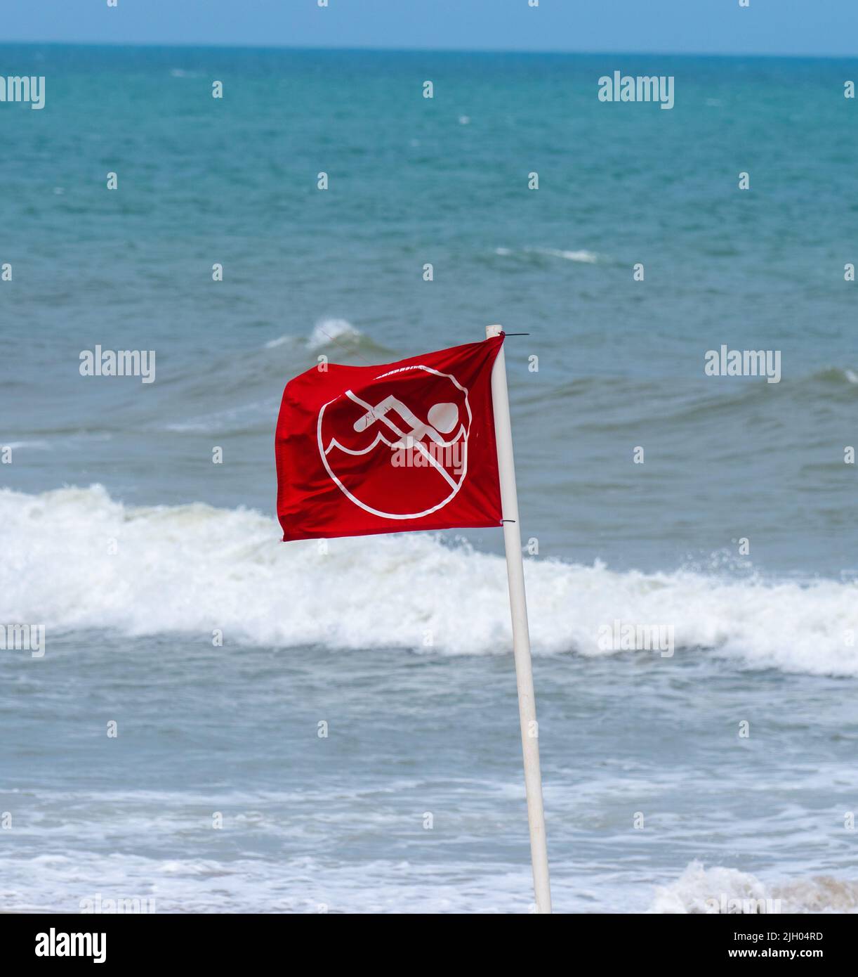 Beach seaside seashore flag hi-res stock photography and images - Alamy