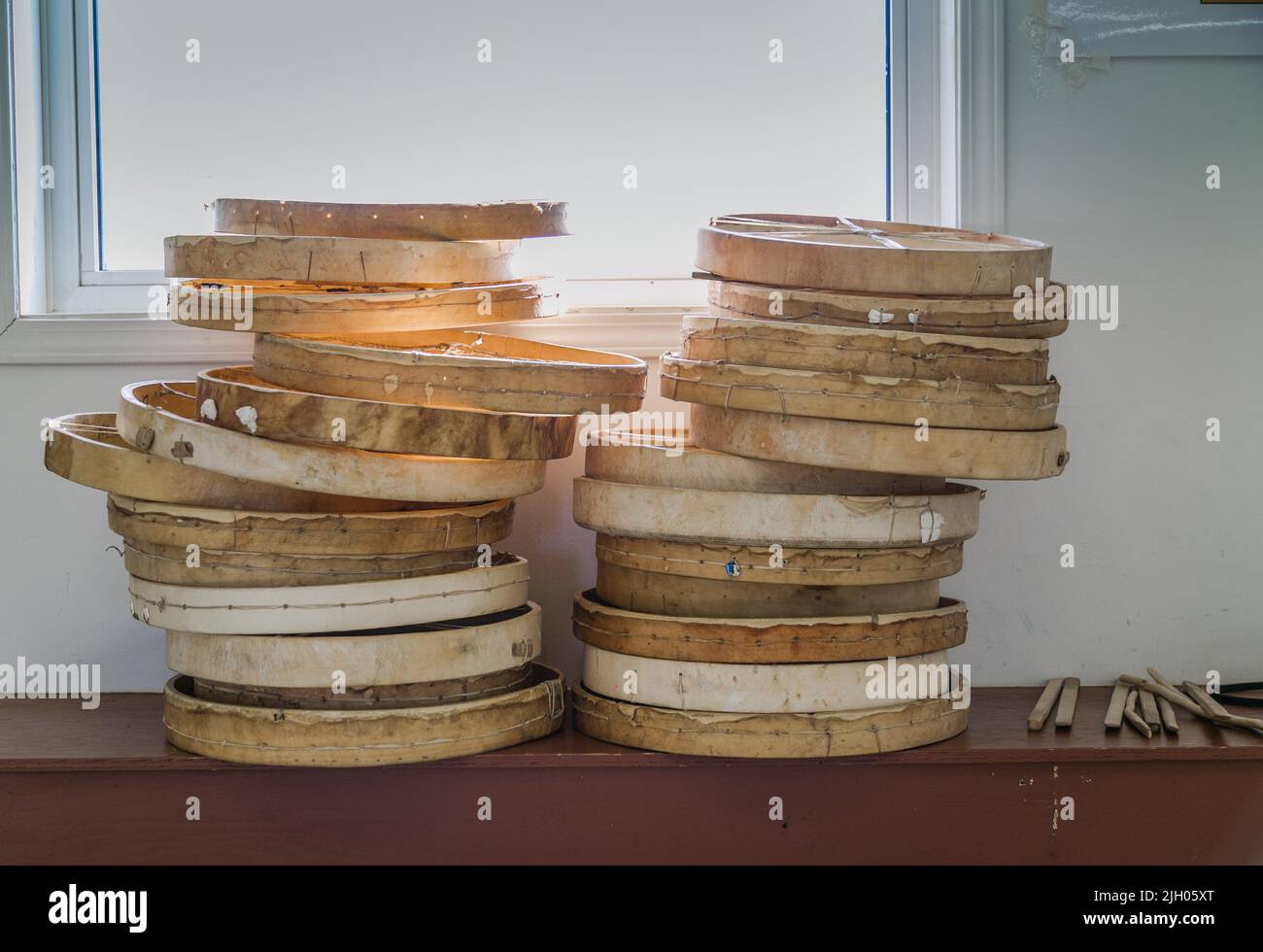 Traditional Dene drums waiting to be played in a drum dance, in the ...
