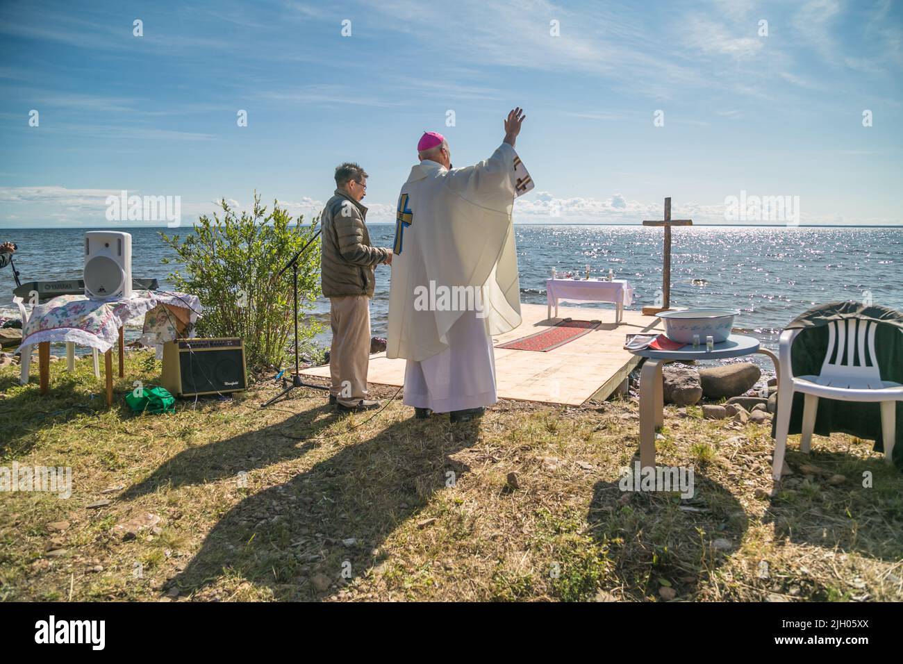 Roman Catholic Bishop Mark Hagemoen with Indigenous Dene man blessing ...
