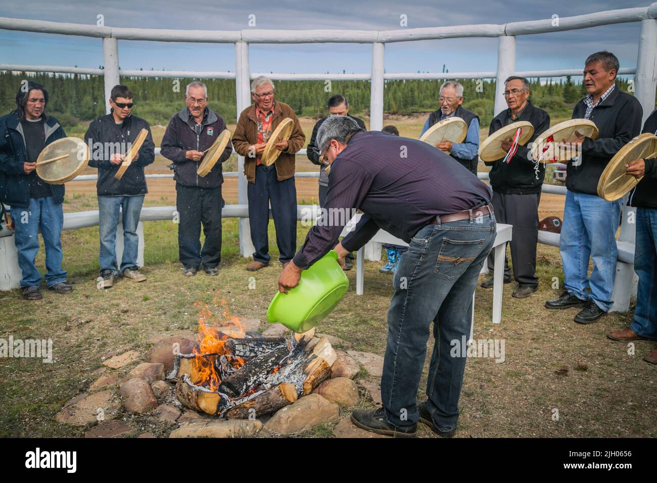 Fire feeding ceremony, in the northern Indigenous community of Deline ...