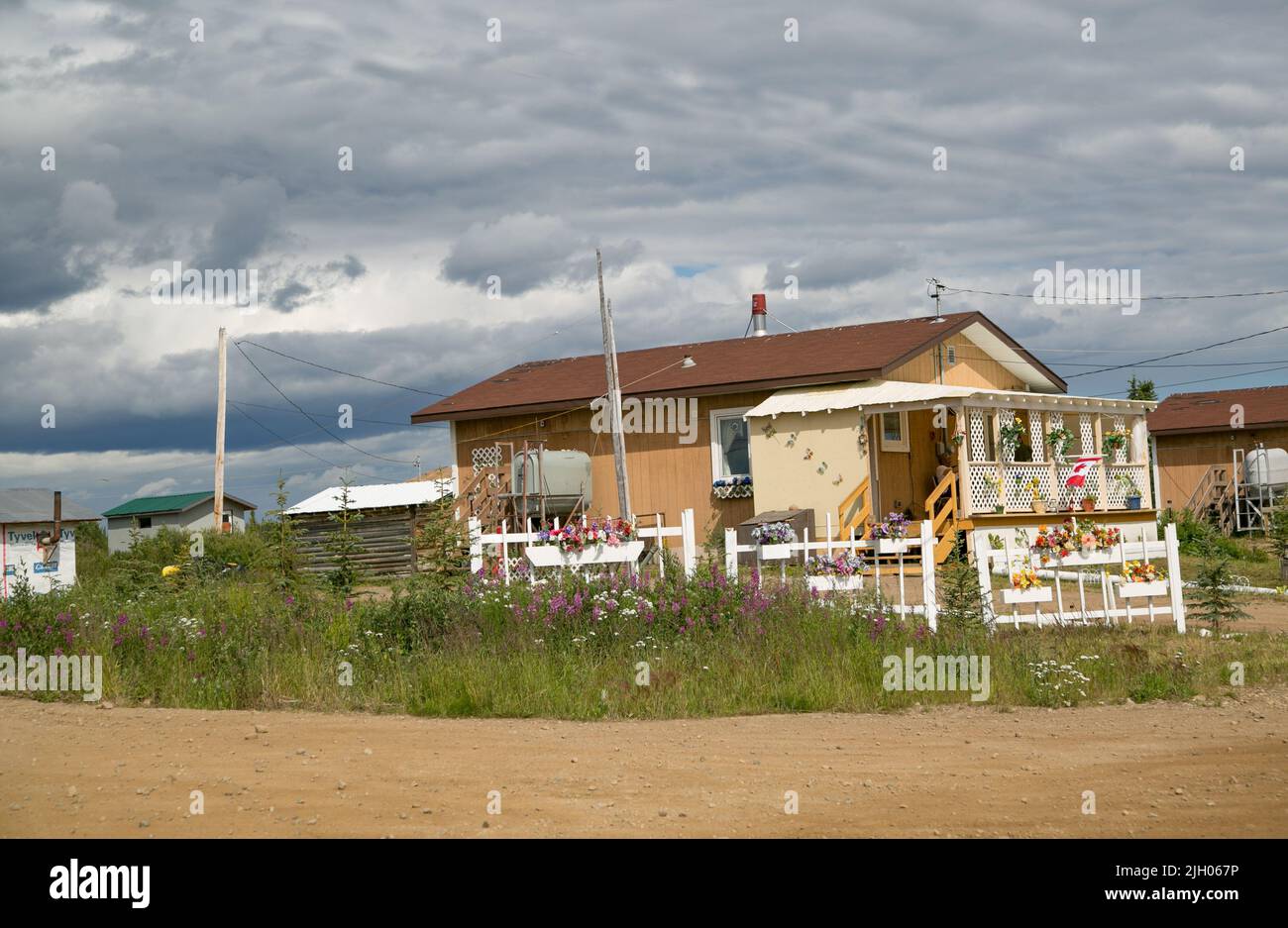 House in summer in the northern Indigenous community of Deline ...