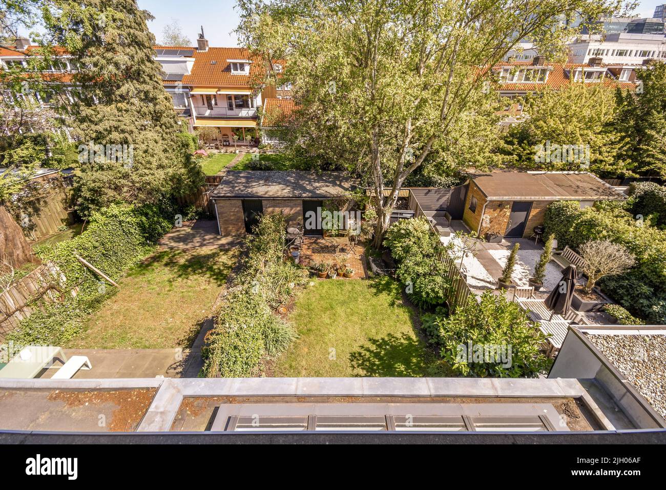 Front view of vegetation from small balcony with railings Stock Photo ...