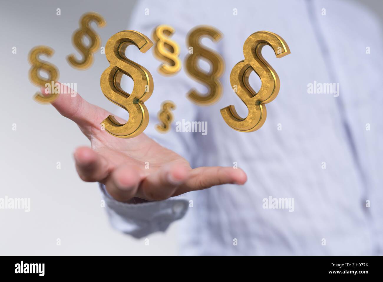 A 3D render of a Symbol of Law and Justice in a male hand on a blurry ...