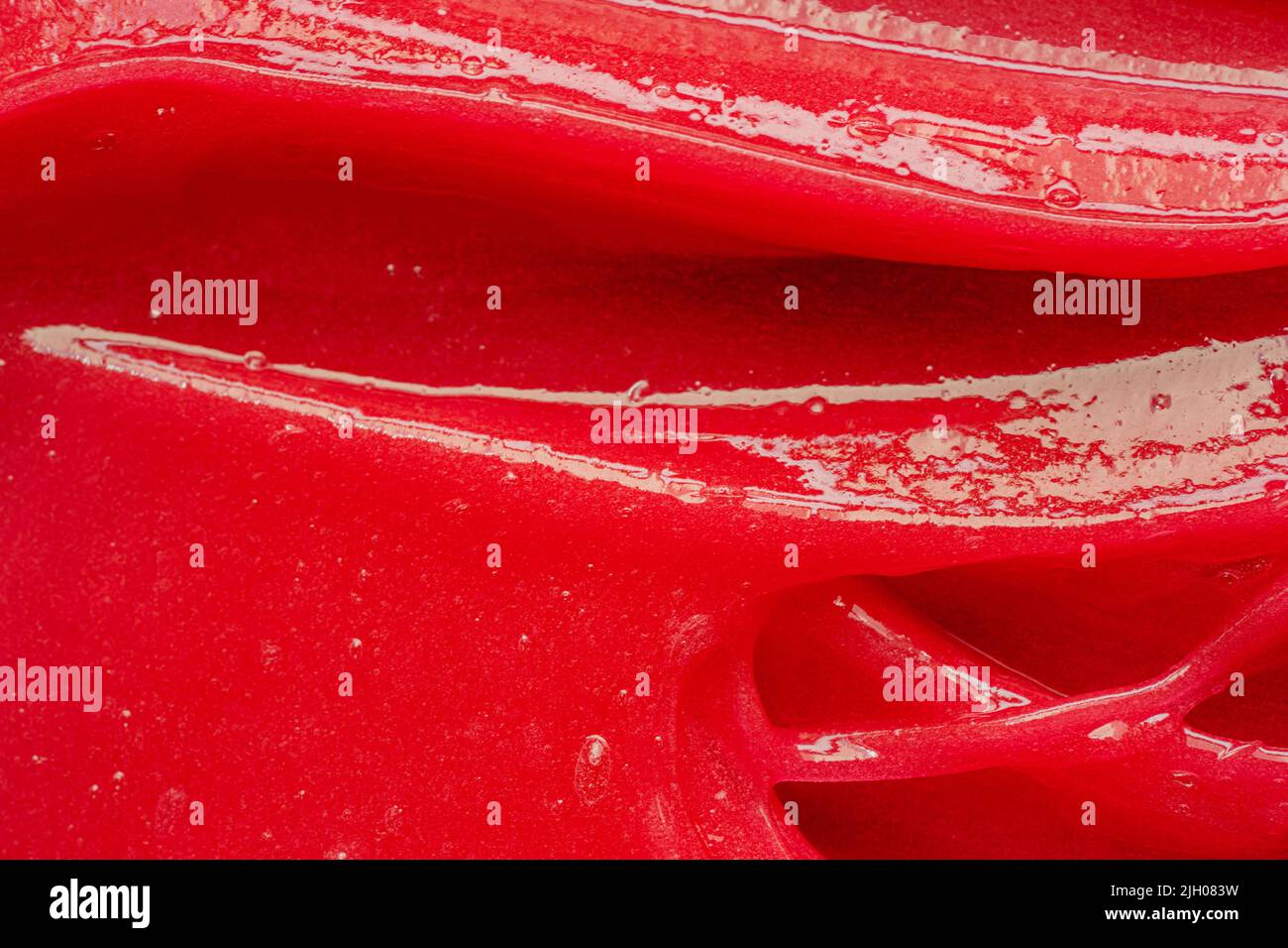 Red gel texture. Cosmetic clear liquid cream smudge. Skin care product ...