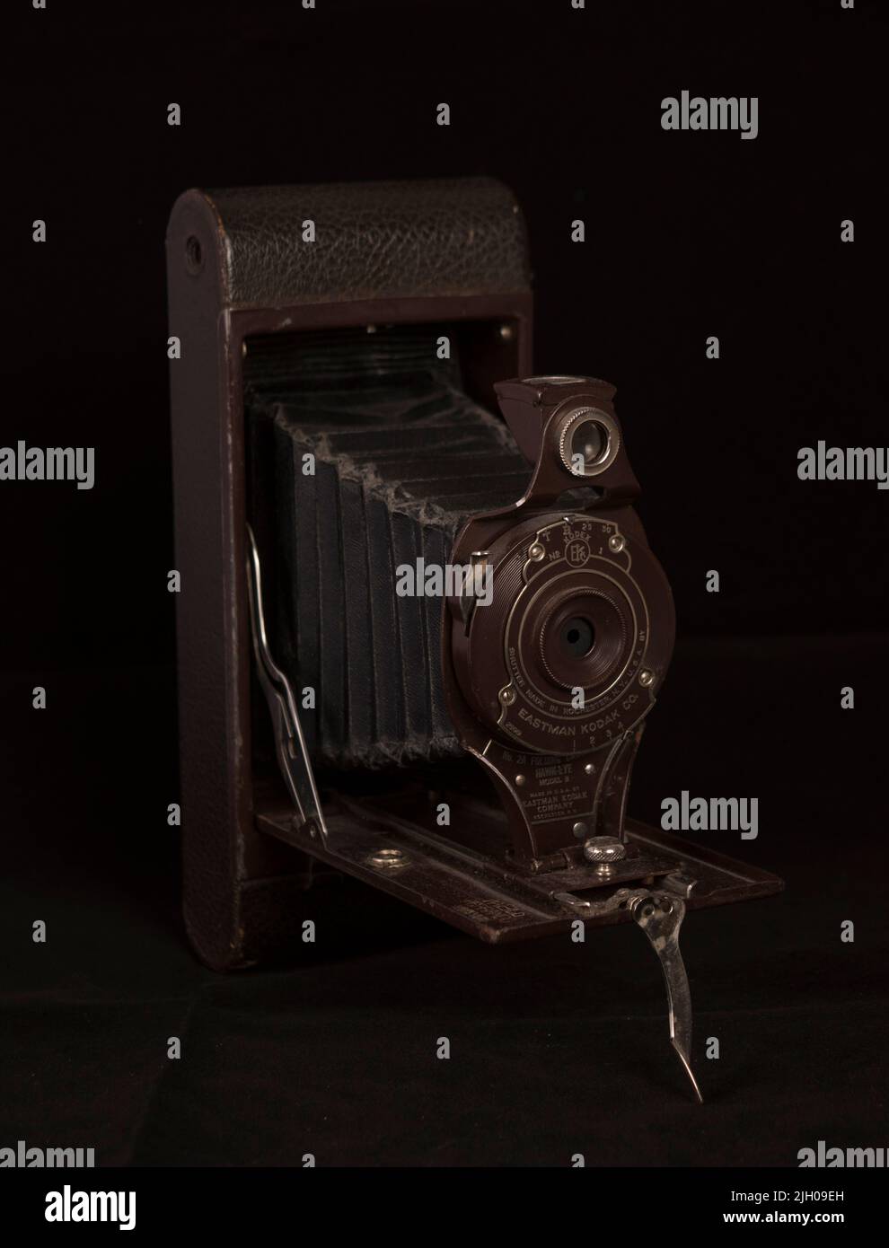 old bellows photographic camera on black background Stock Photo - Alamy