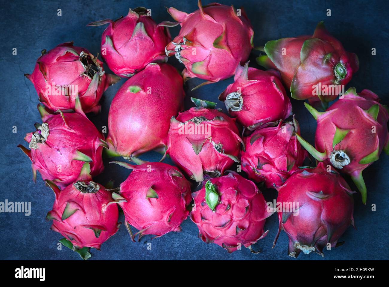 dragon fruit pitahaya on dark background , fresh dragon fruit tropical ...