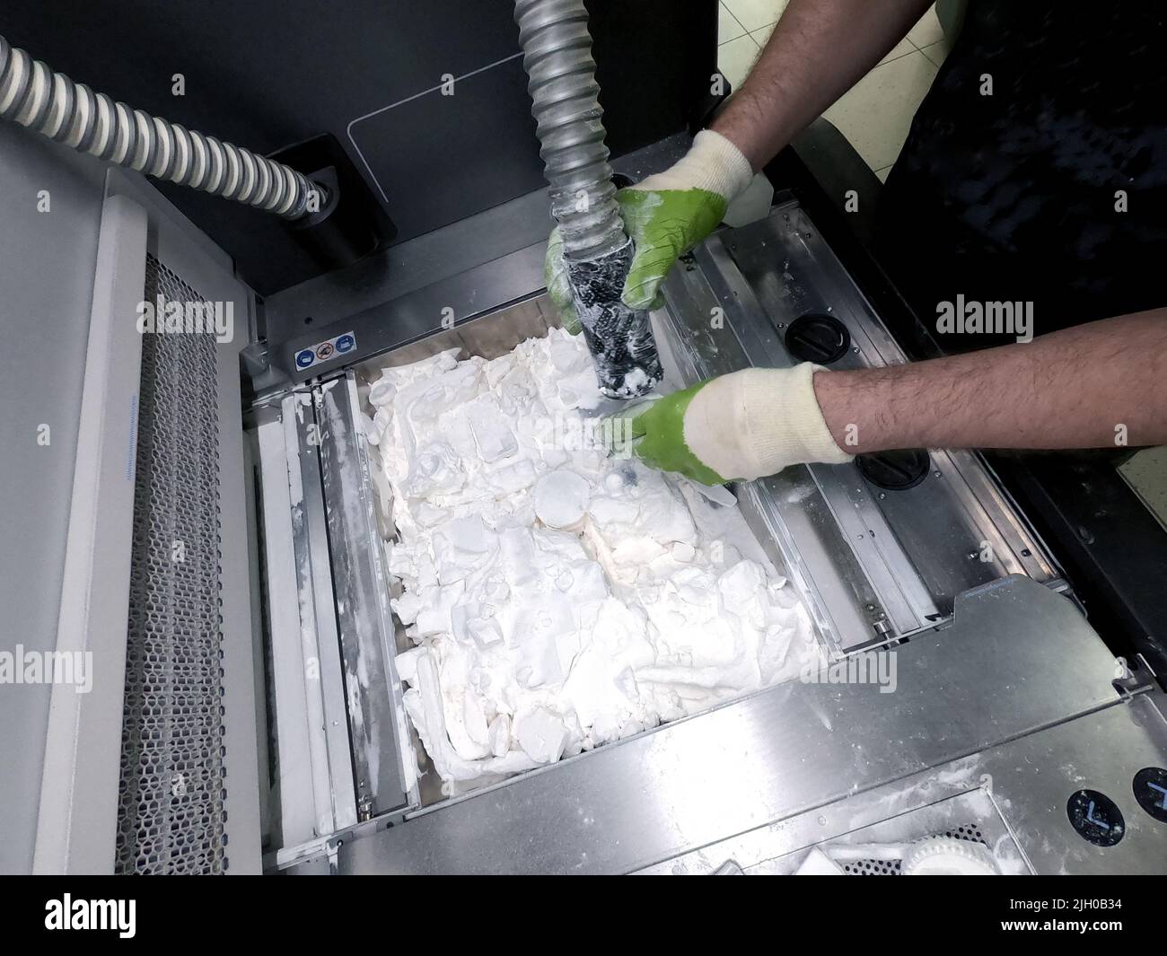 Engineer or artist designer printing 3D parts and shaping models from ...