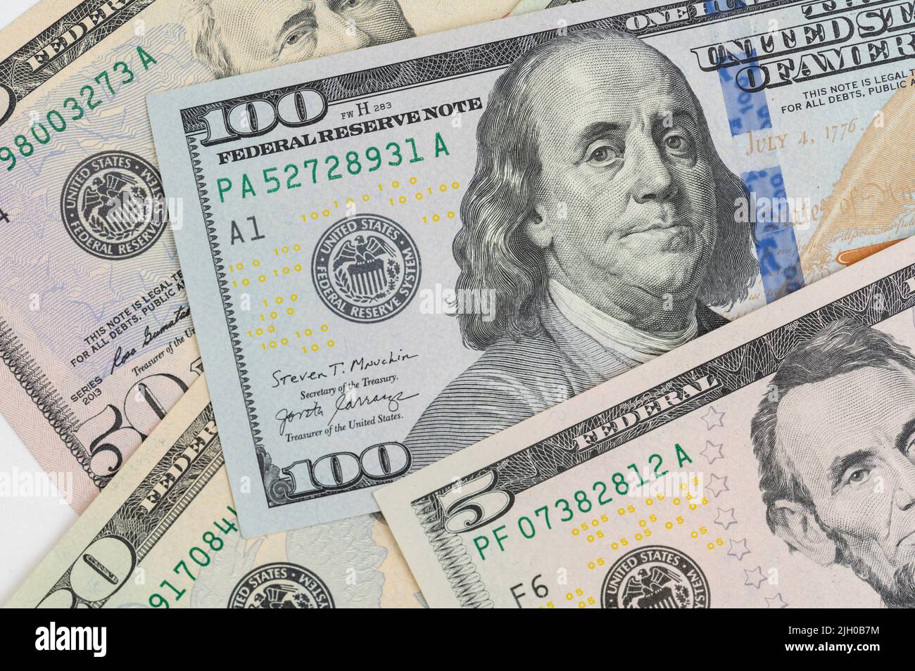 5, 20, 50, 100 dollars banknotes at different angles. Close up of ...