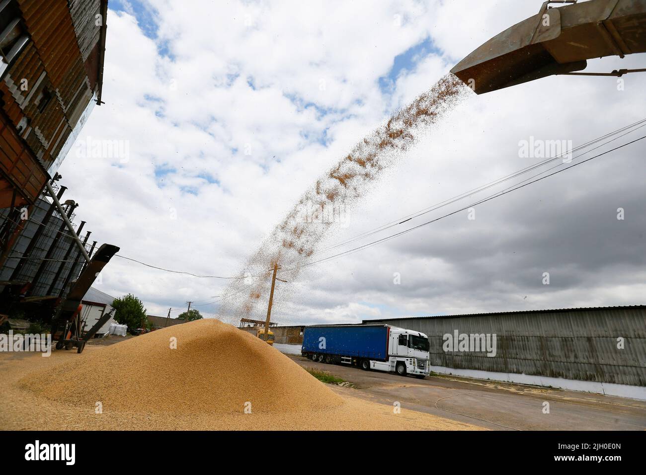 The mix of wheat and barley grains are seen at a grain terminal in ...