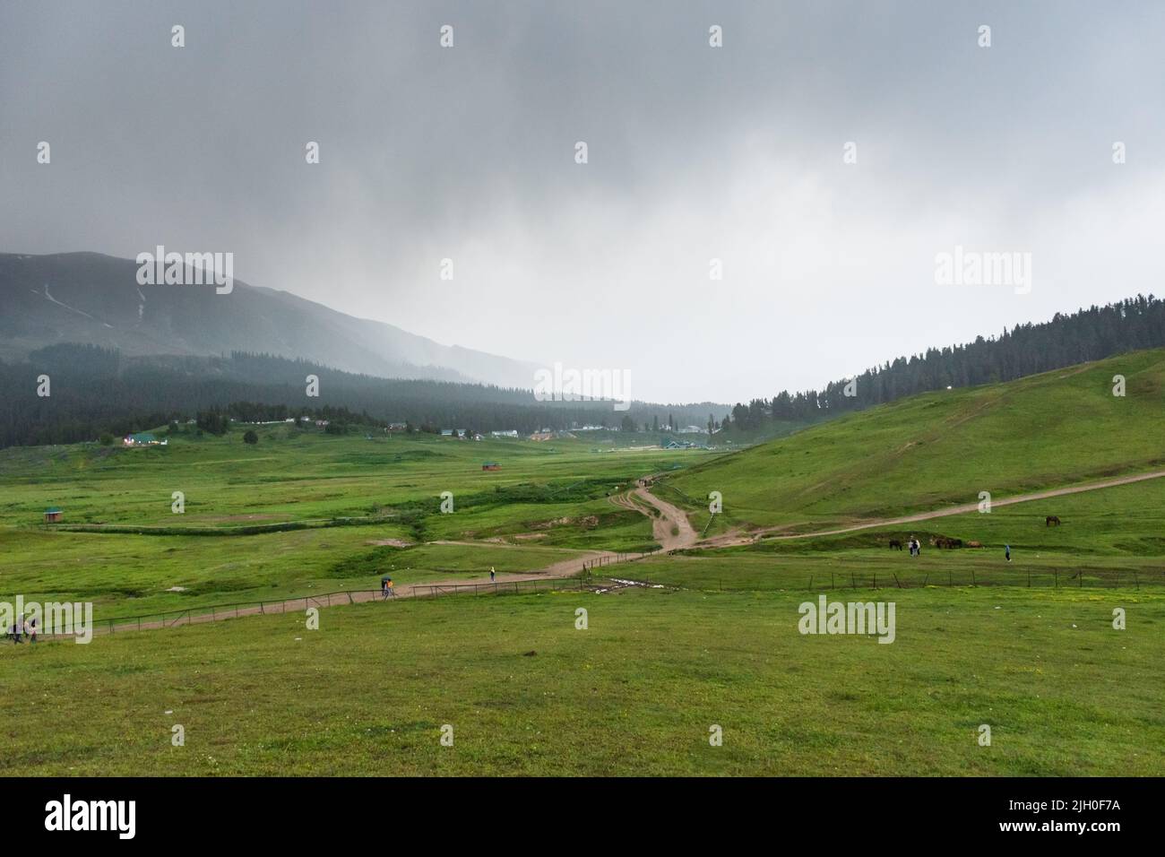 Landscape with mountains and clouds in Gulmarg, hill station, popular ...