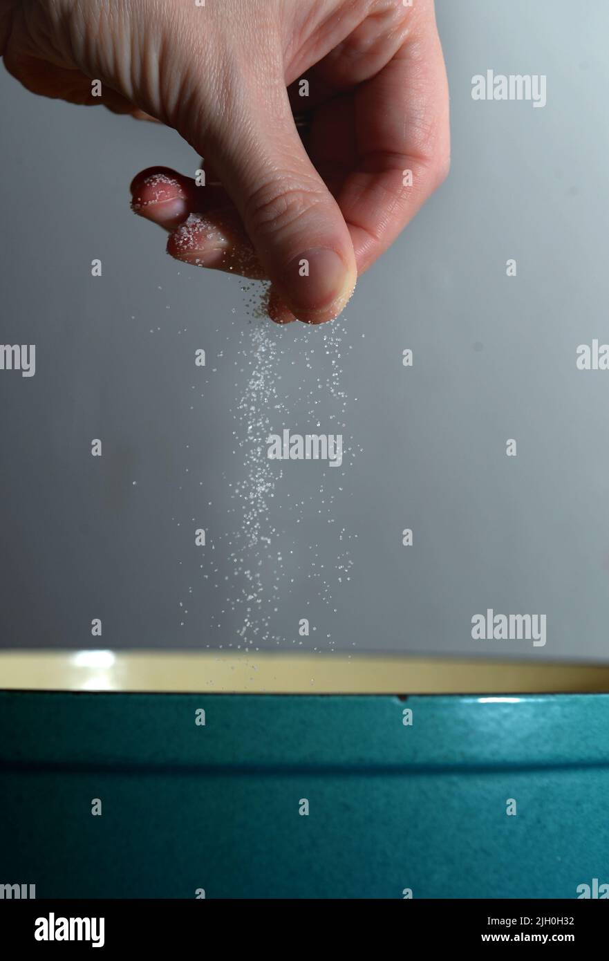 File photo dated 18/11/15 of table salt being added to a saucepan, as ...