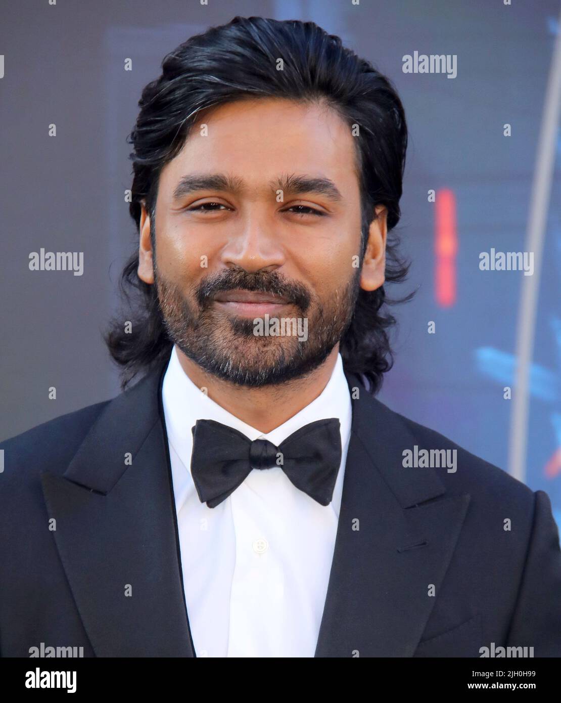 Hollywood, USA. 13th July, 2022. Dhanush arrives at THE GRAY MAN World ...