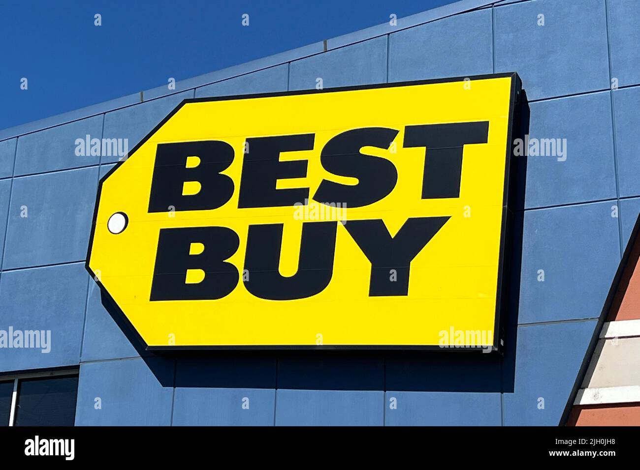 A Best Buy electronics store logo sign at the Gateway Shopping Center ...