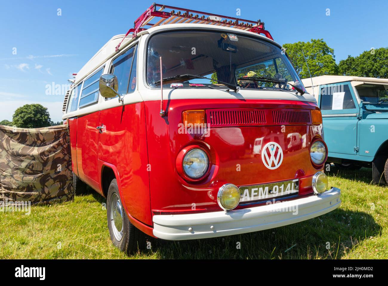 front view red vintage Volkswagen Type 2 transporter Kombi or microbus ...