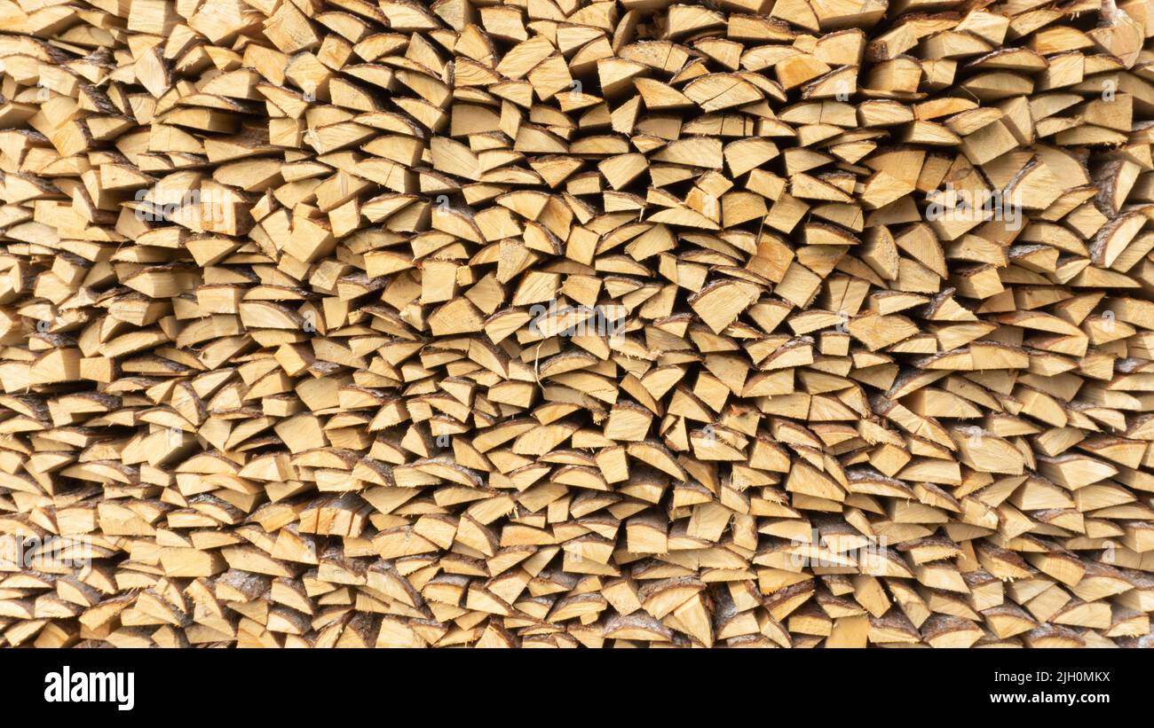 Wall of firewood, Wooden background. Natural texture. Background of dry ...